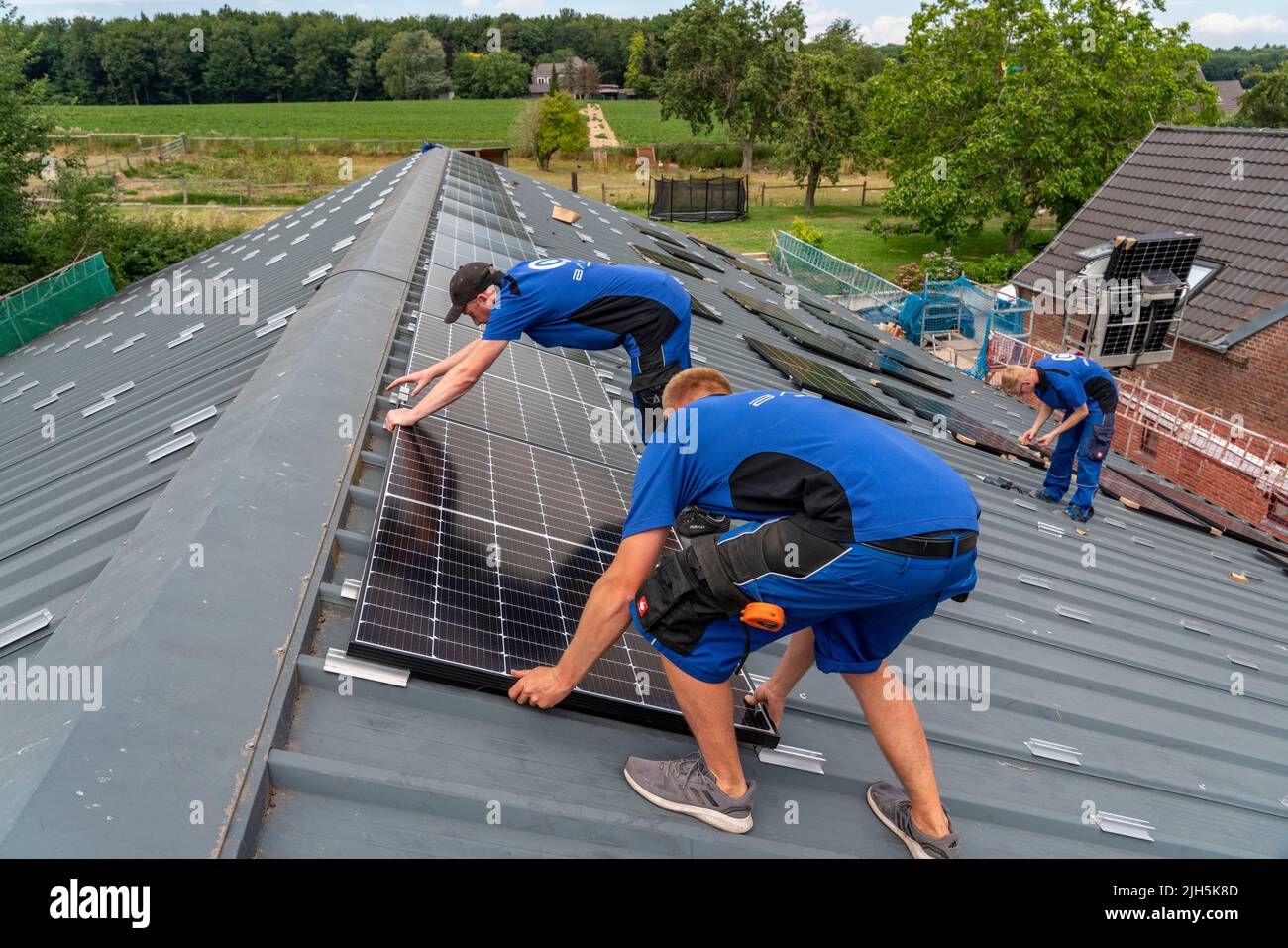 Installation of solar modules on the roof of a barn, a farm, over 240 ...