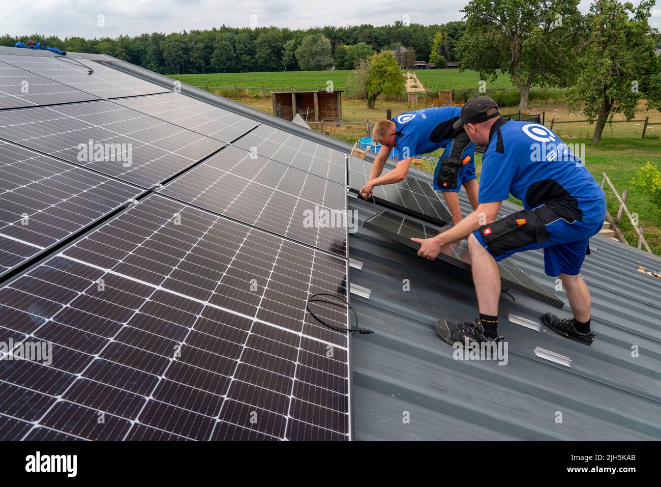 Installation of solar modules on the roof of a barn, a farm, over 240 ...