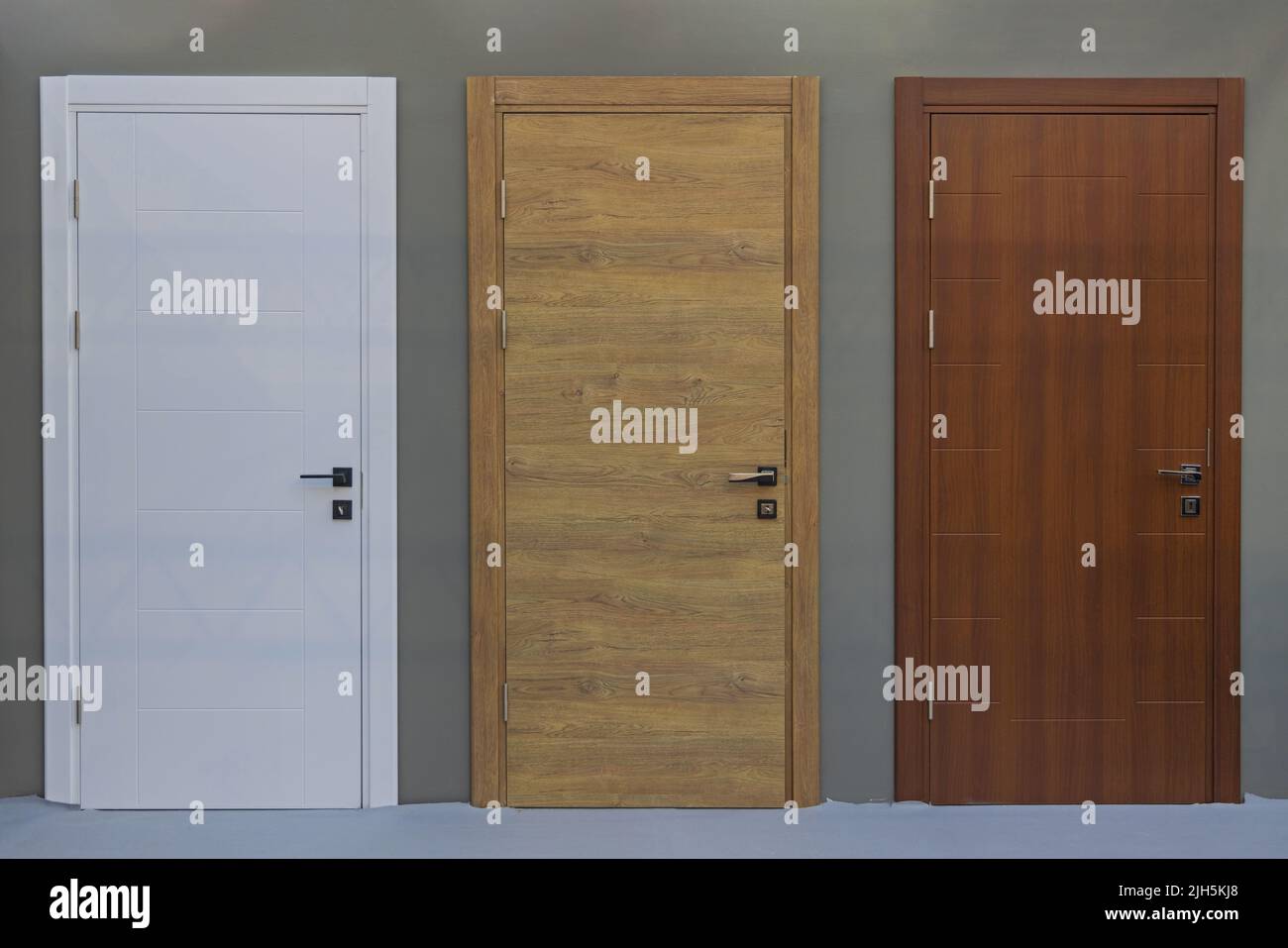 Closed Three Wooden Doors Choice in Home Interior Stock Photo - Alamy
