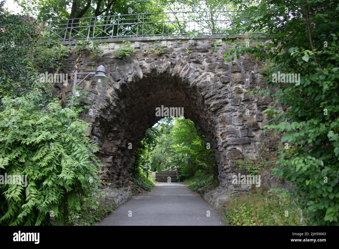 Old gate made of natural stones as a bridge hi-res stock photography ...