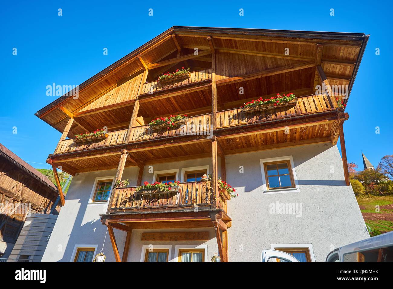 Modern wooden alpine Style Architecture with Balcony and varnished ...