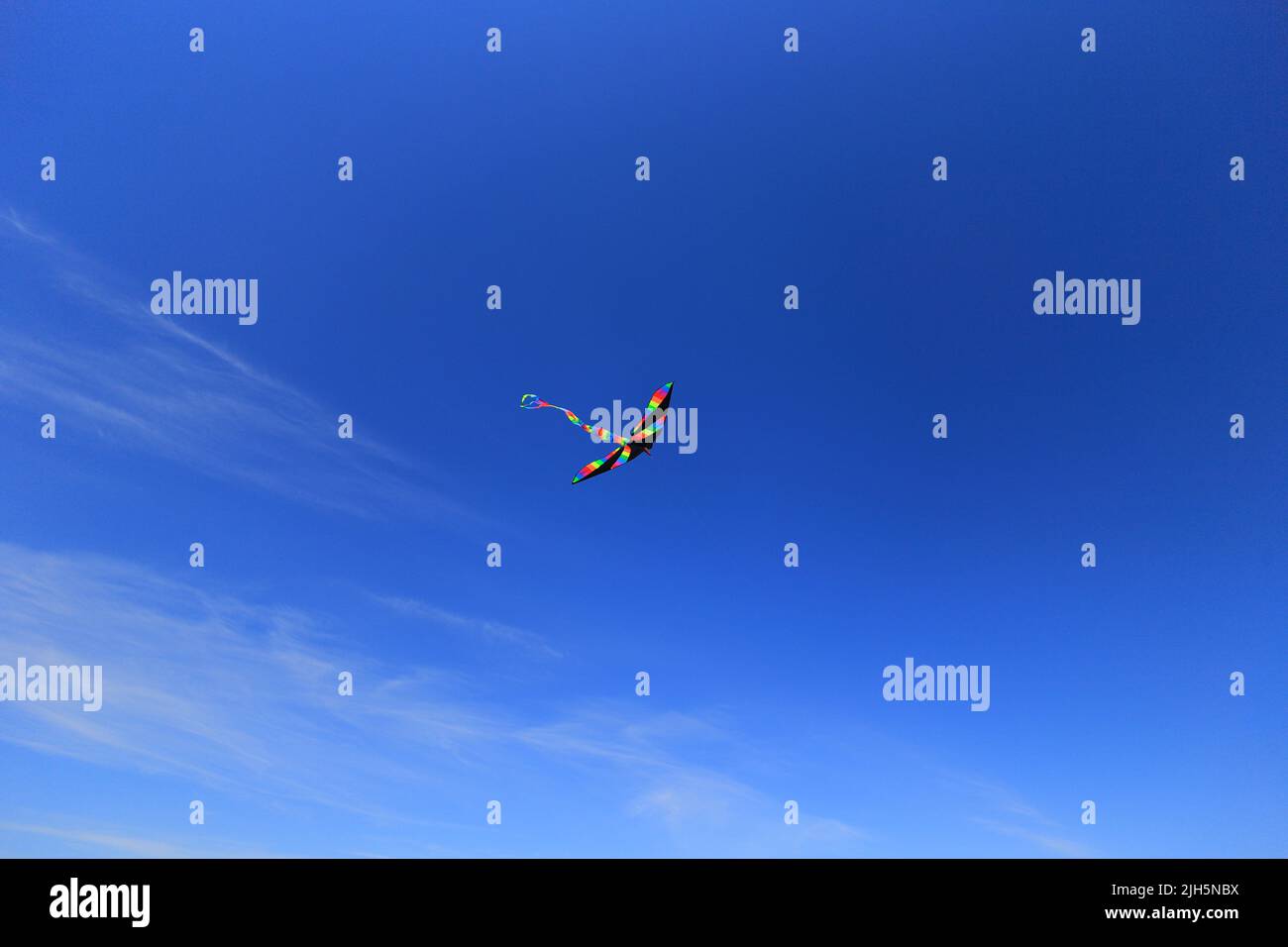 Beautiful kite in the blue sky the summer. Blue sky Stock Photo - Alamy