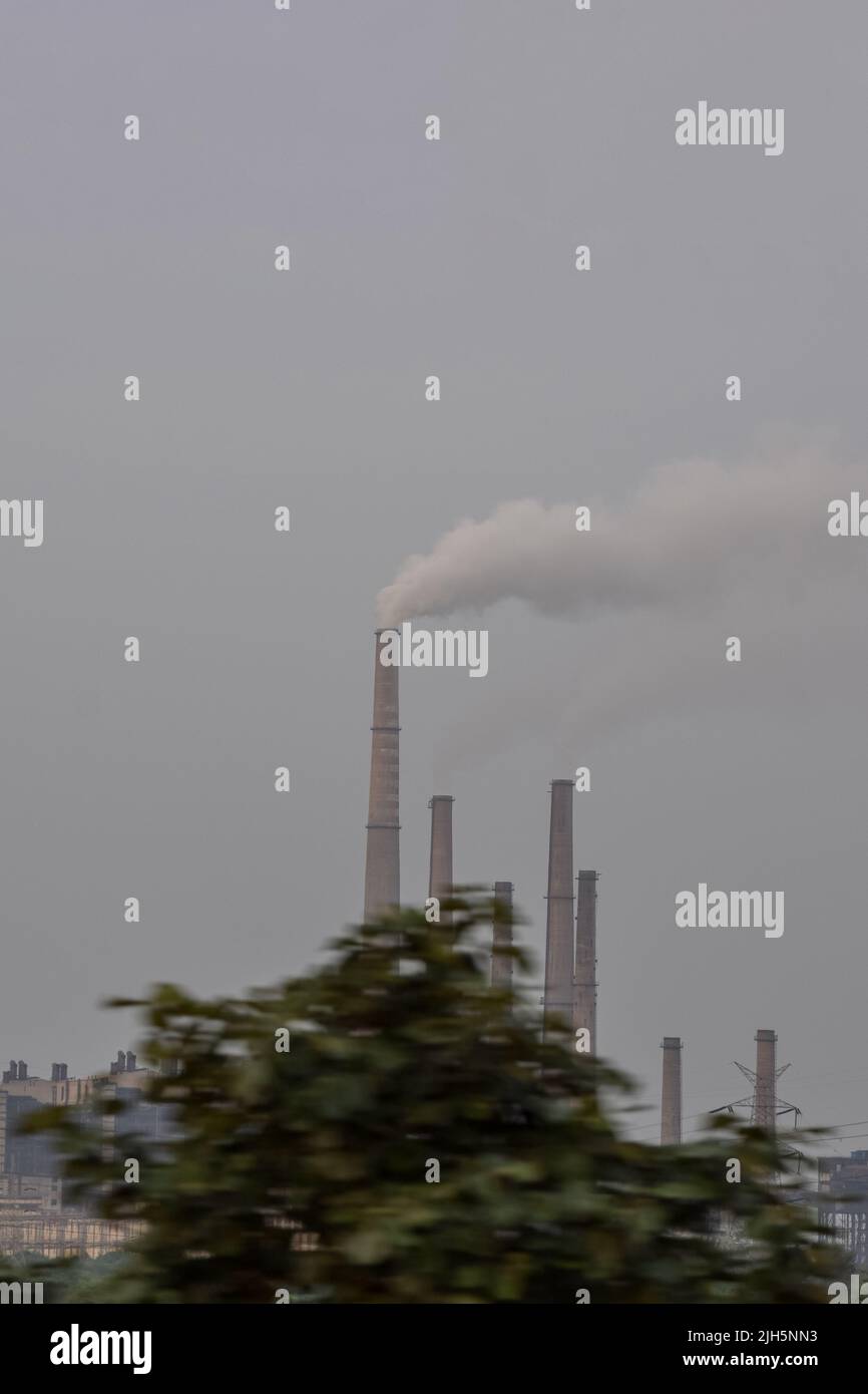 Environment pollution due to factory , smoke is coming out of the ...