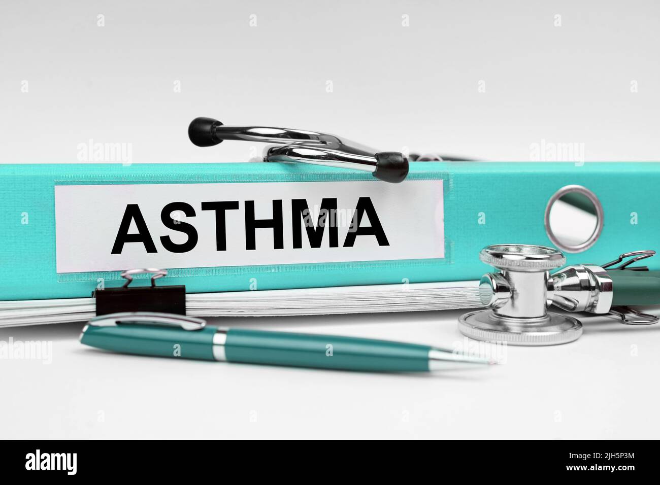 Medicine concept. On the book is a stethoscope and a folder with the ...