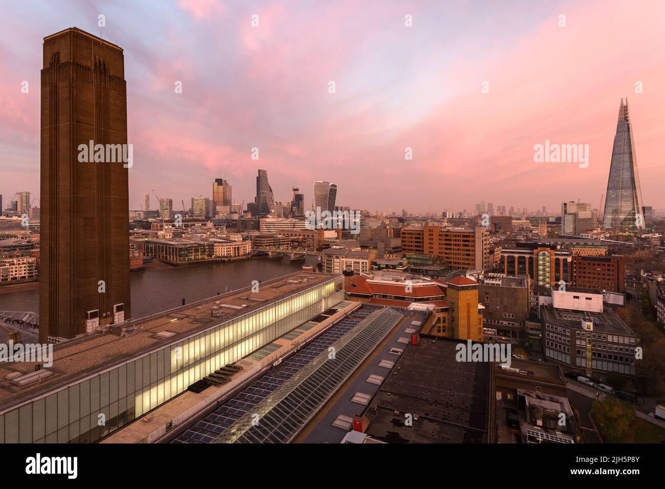 A high point image of the London skyline at sunset, looking across the ...