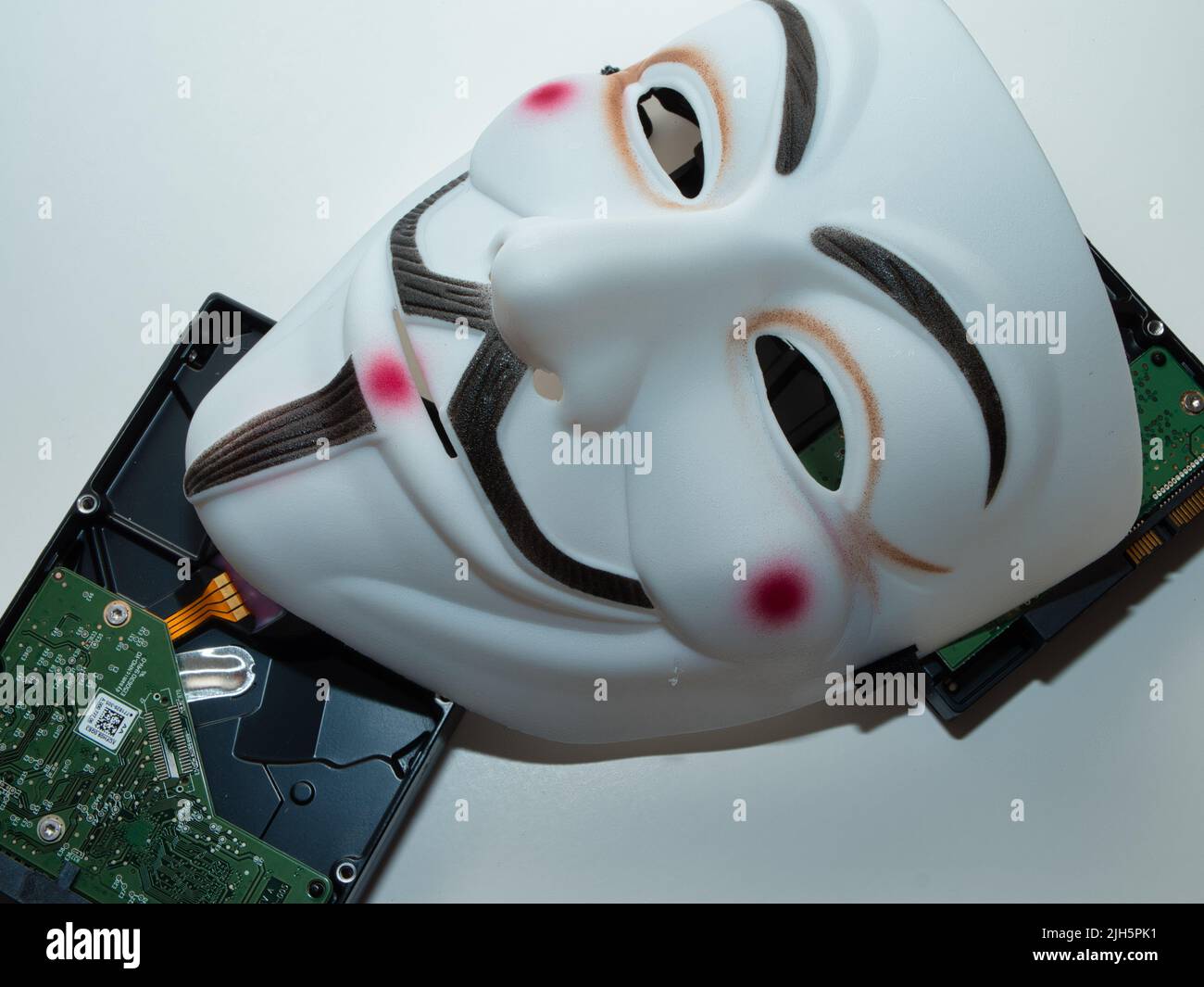 Guy Fawkes like Anonymous style hacker mask. Excellent imagery for ...