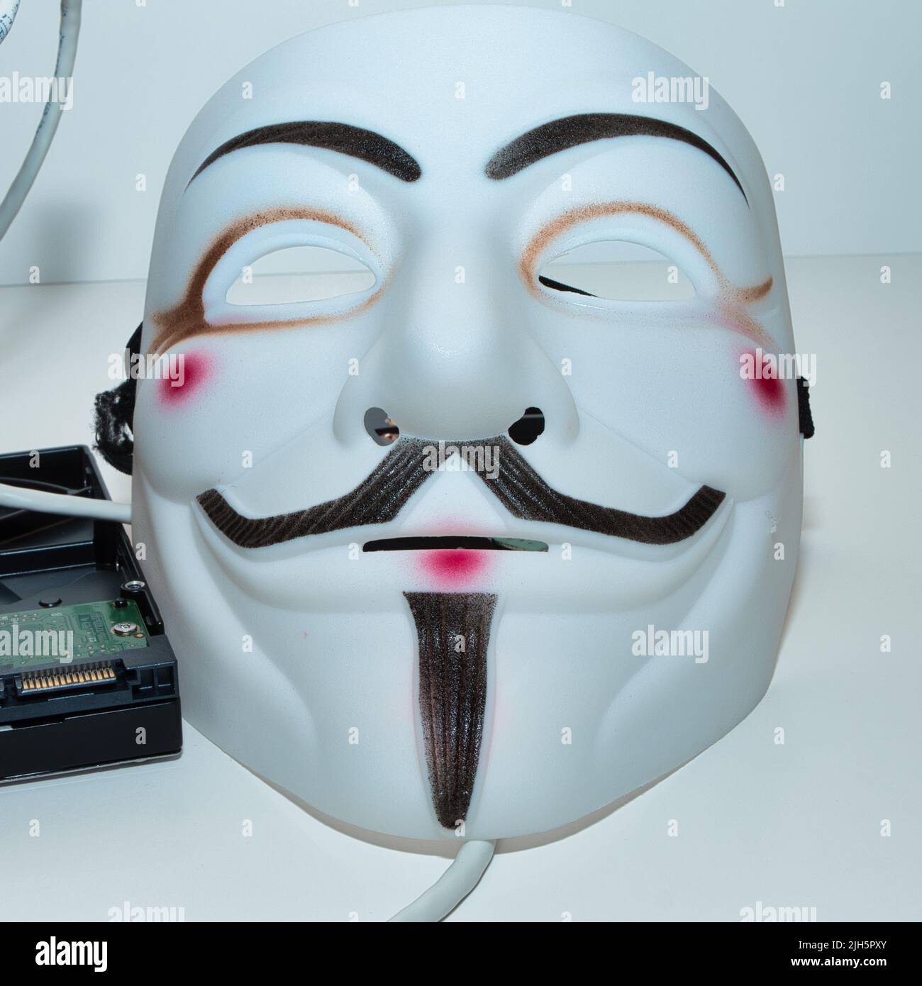 Guy Fawkes like Anonymous style hacker mask. Excellent imagery for ...