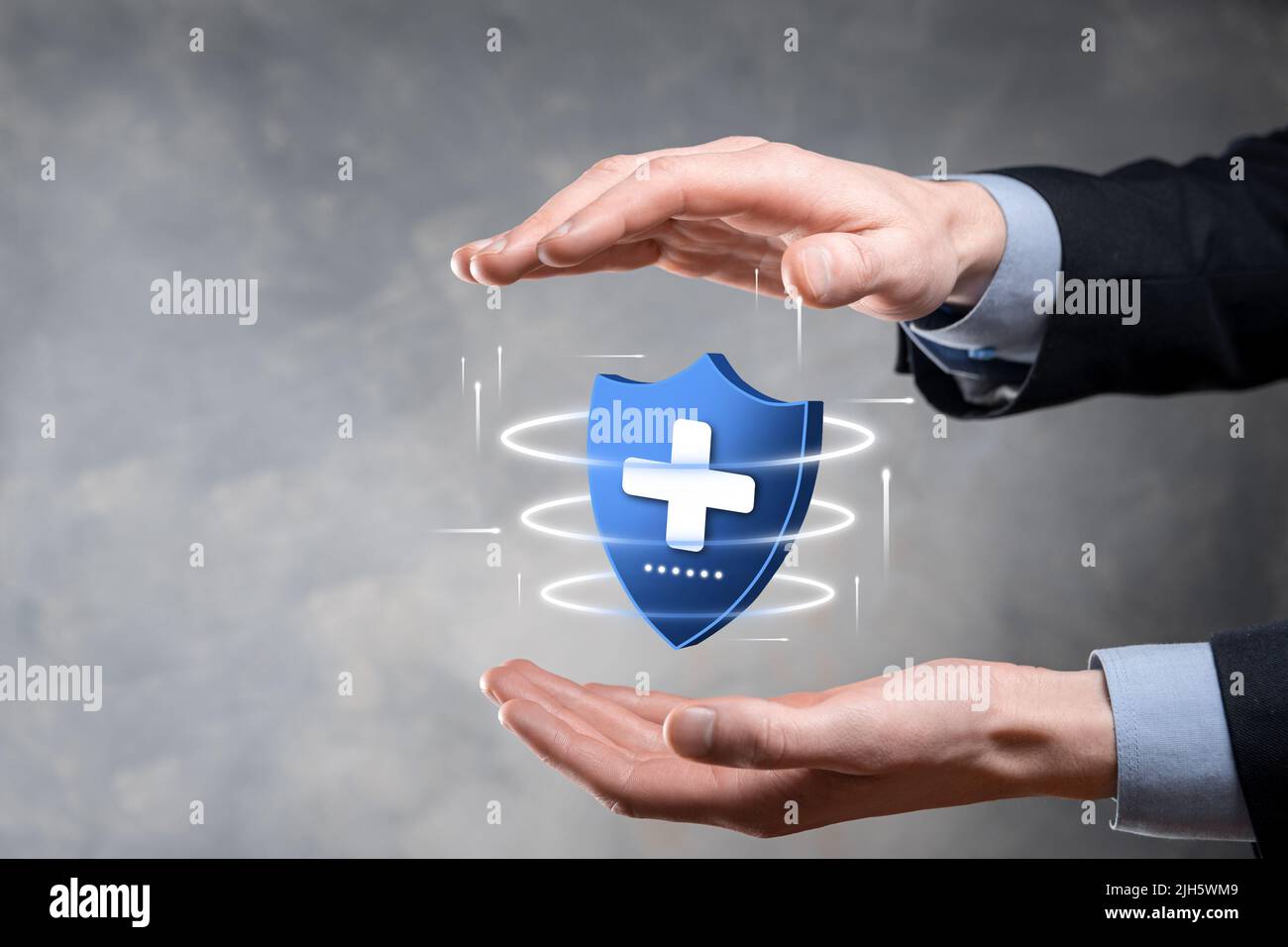 Businessman hold Shield with plus Low polygonal icon, medicine icon ...