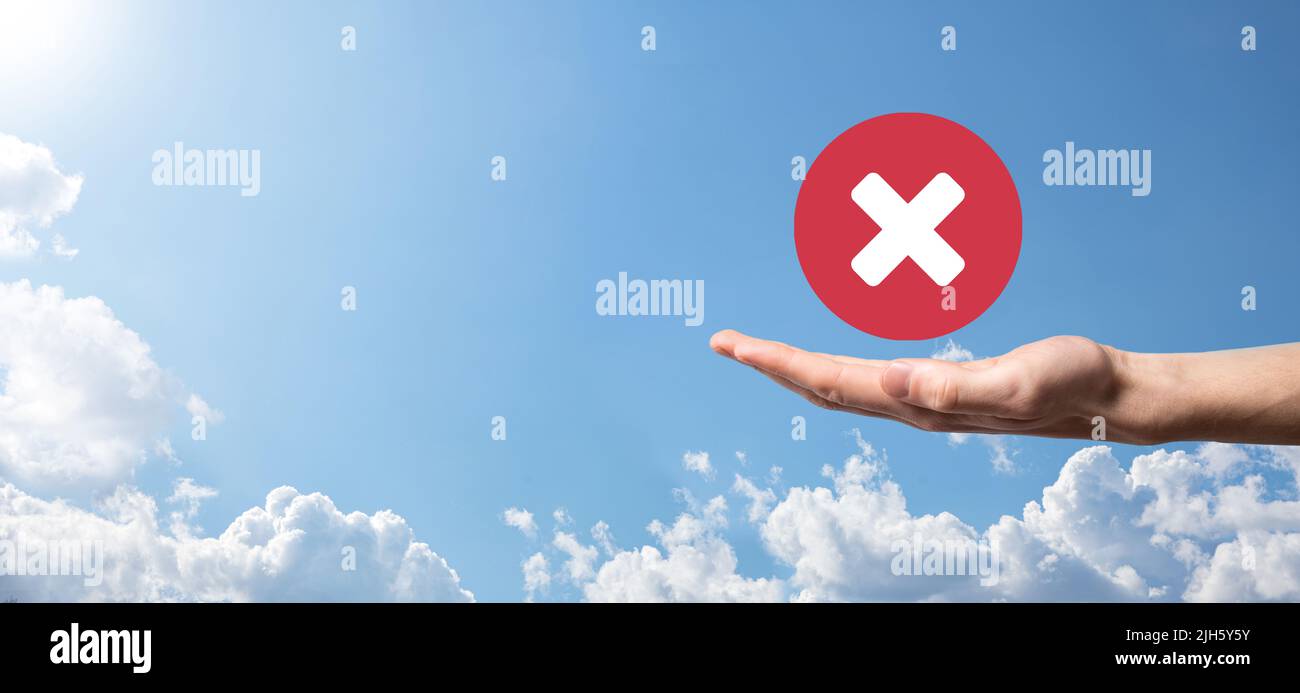 Hand holds icon,cancellation symbol,cancel icon.Cross mark flat red ...