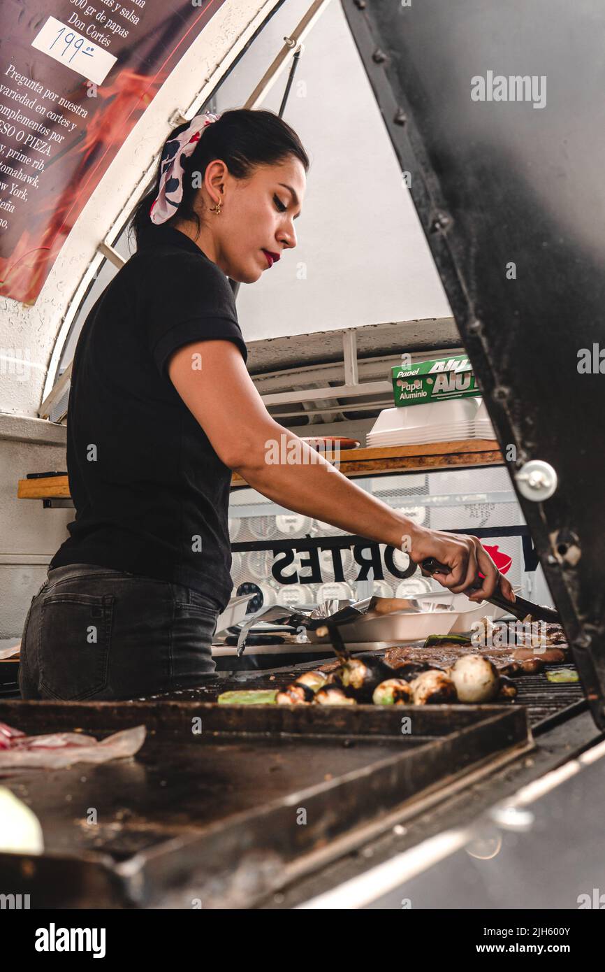 Mexican girl cooking hi-res stock photography and images - Alamy