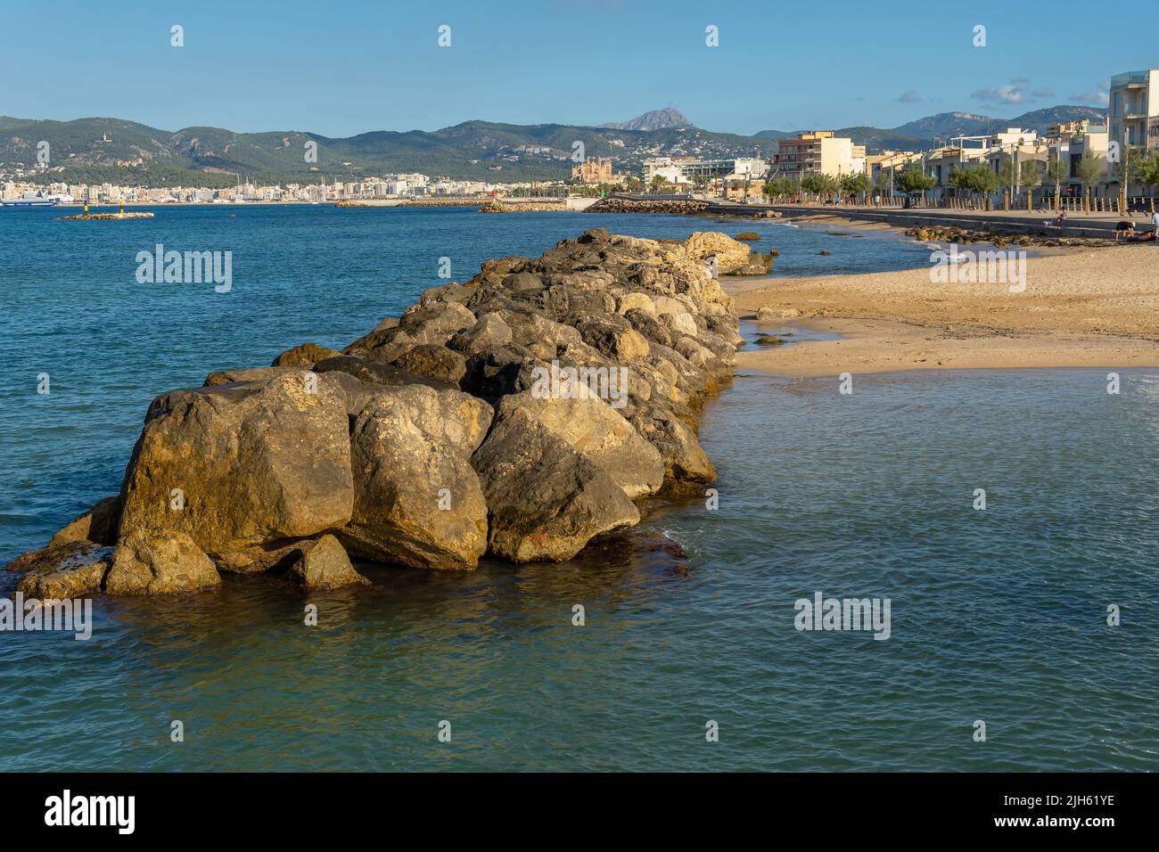 Promenade of the Mallorcan town of Es Molinar at sunrise Stock Photo ...