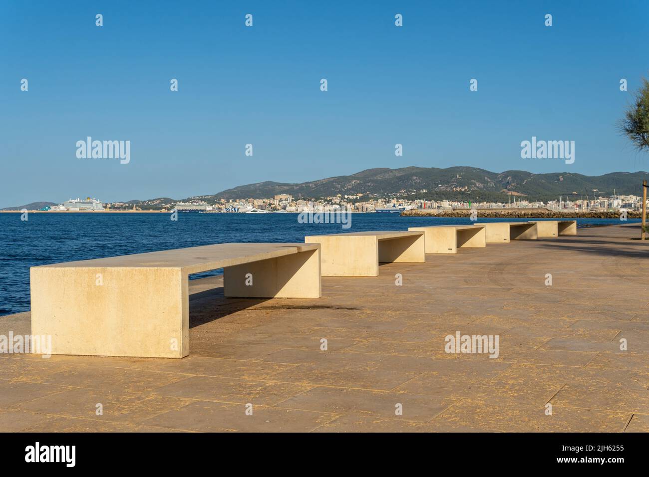 Promenade of the Mallorcan town of Es Molinar at sunrise Stock Photo ...