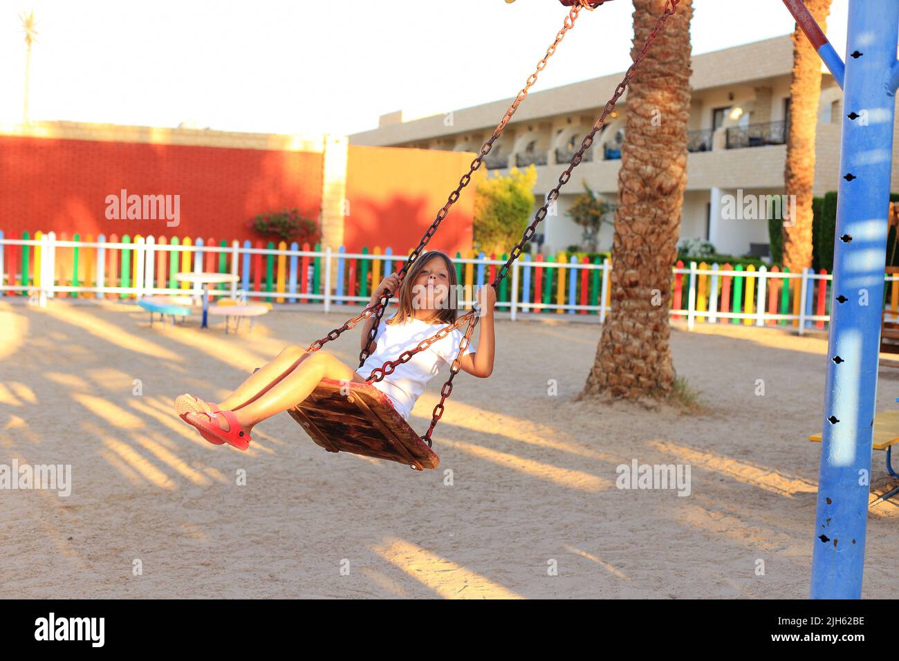 Child swing playground portrait hi-res stock photography and images - Alamy