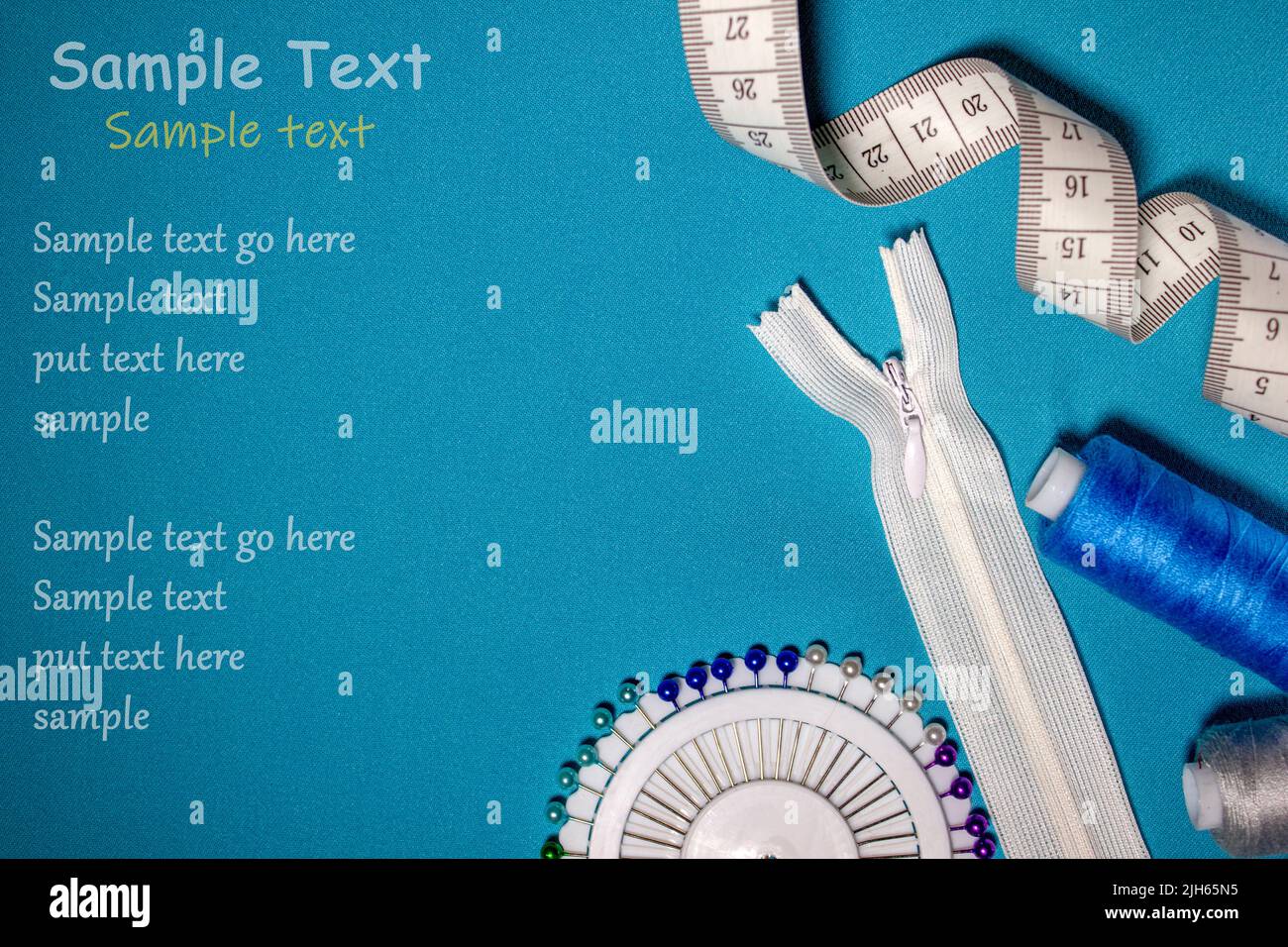 Blue textured background with sewing tools, copy space on background ...