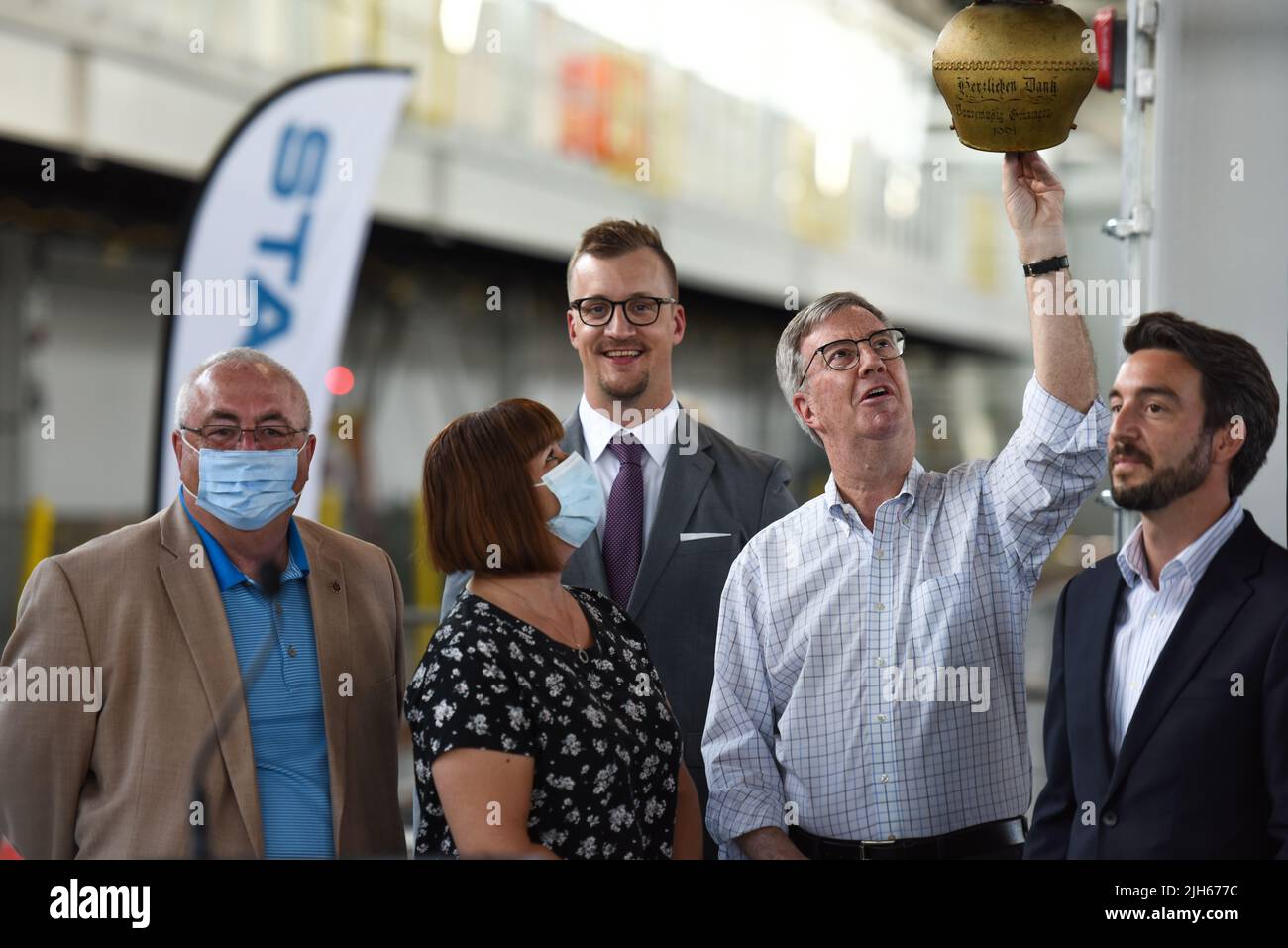 Canada. 15th July, 2022. Ottawa Mayor Jim Watson, second right, rings a ...