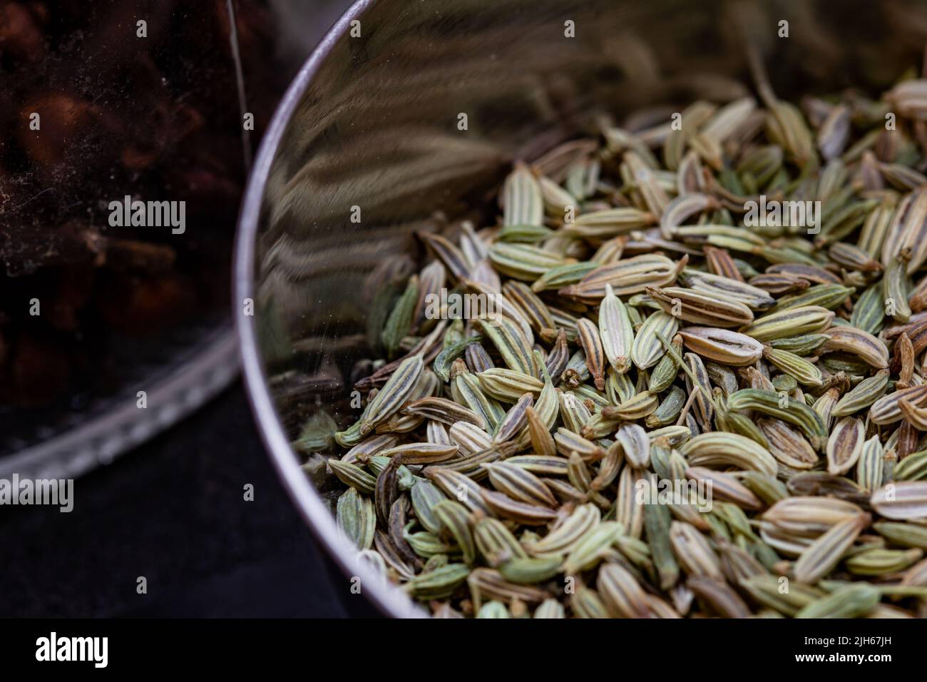Fennel seeds in a bowl. Commonly used fennel spice in cuisines around ...