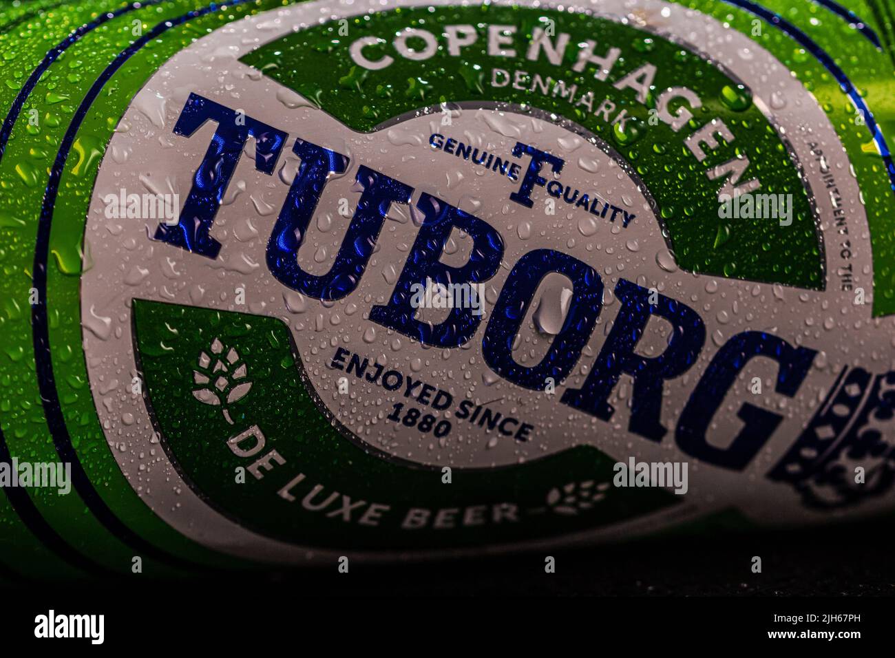 Condensation water droplets on Tuborg beer can isolated on black ...