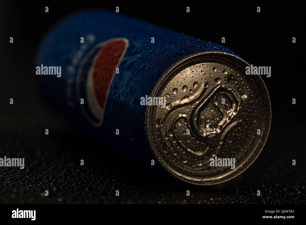 Editorial photo of Pepsi can with water droplets on black background ...