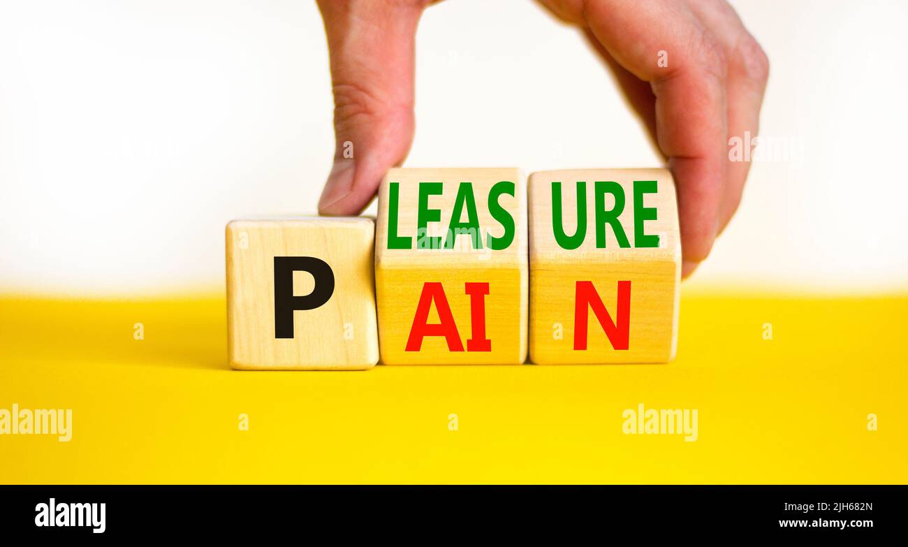 Pain or pleasure symbol. Concept words Pain or Pleasure on wooden cubes ...