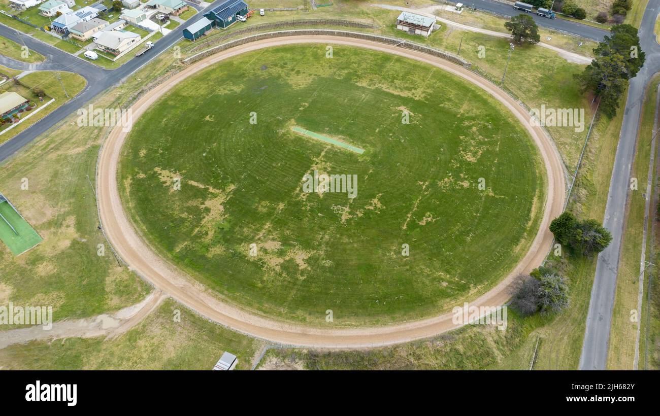 Drone aerial photograph of a large round sports field with an external ...