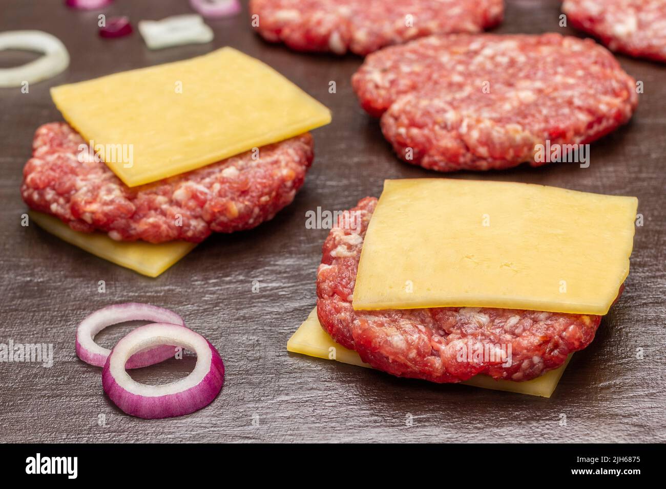 Top view raw cheeseburger hi-res stock photography and images - Alamy