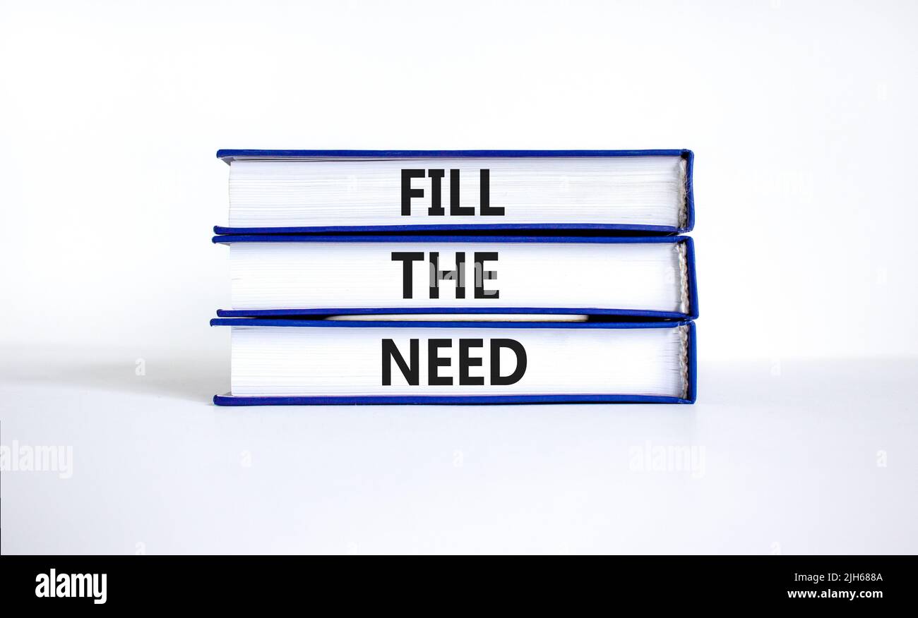 Fill the need symbol. Concept words Fill the need on books on a ...