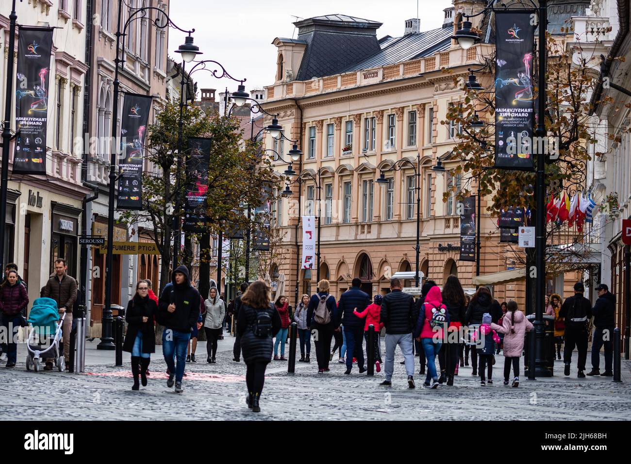 People and tourists wandering in old town Sibiu, Romania, 2022 Stock ...