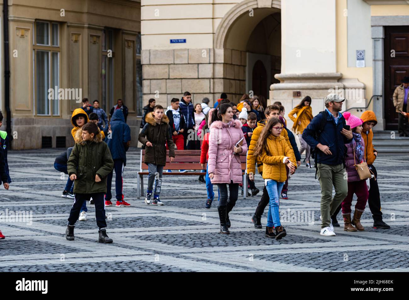 People and tourists wandering in old town Sibiu, Romania, 2022 Stock ...