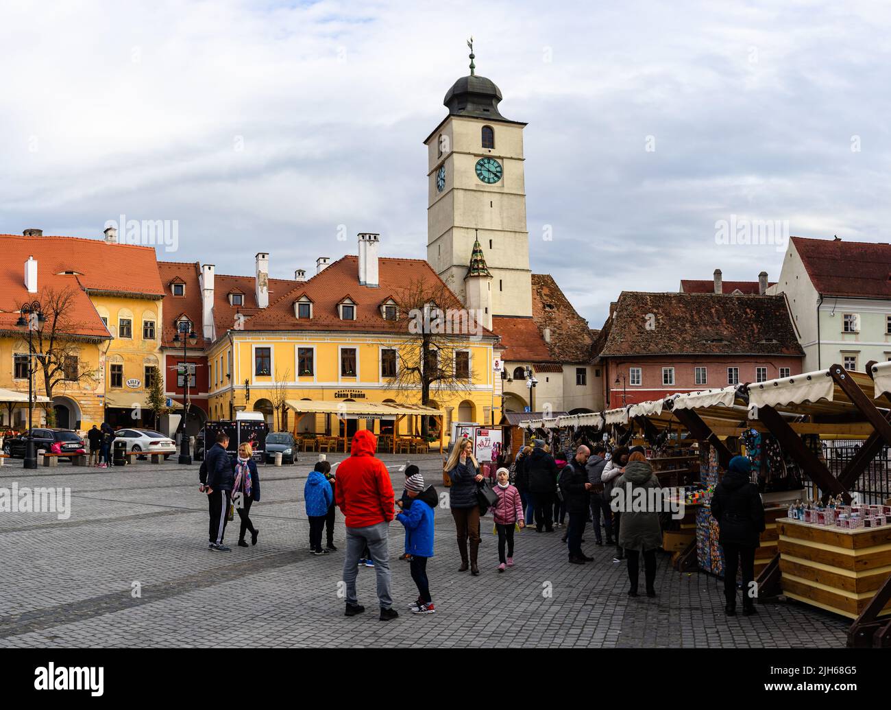 People and tourists wandering in old town Sibiu, Romania, 2022 Stock ...