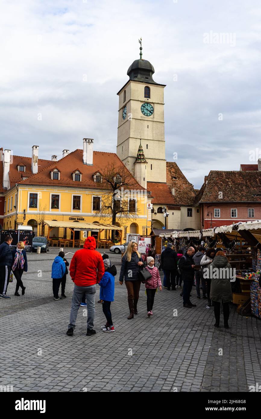 People and tourists wandering in old town Sibiu, Romania, 2022 Stock ...
