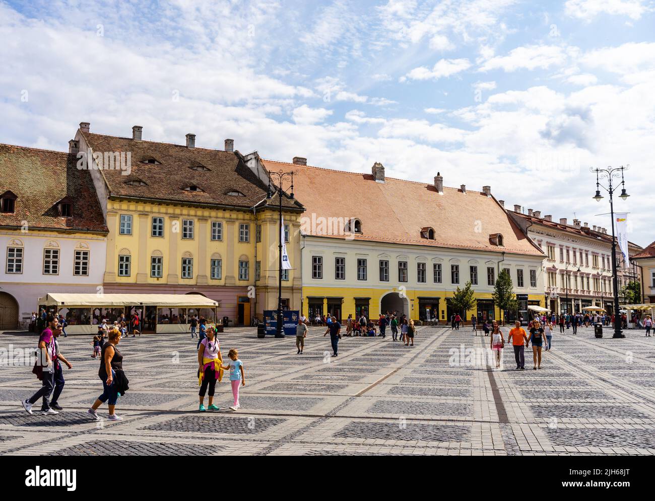 People and tourists wandering in old town Sibiu, Romania, 2022 Stock ...