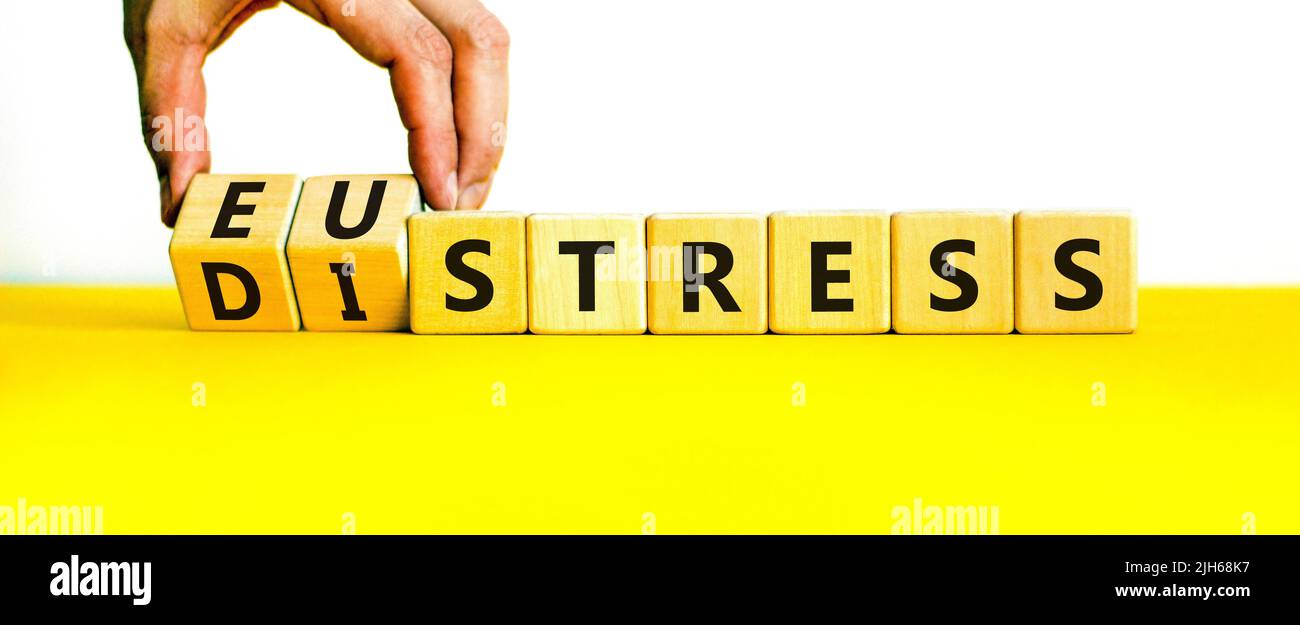 Eustress or distress symbol. Psychologist turns cubes and changes the ...