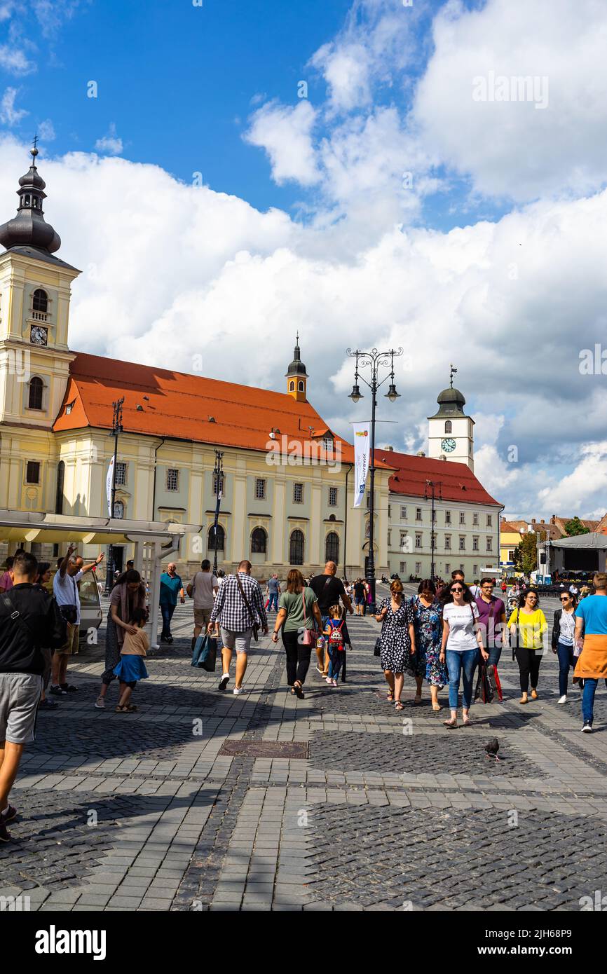 People and tourists wandering in old town Sibiu, Romania, 2022 Stock ...