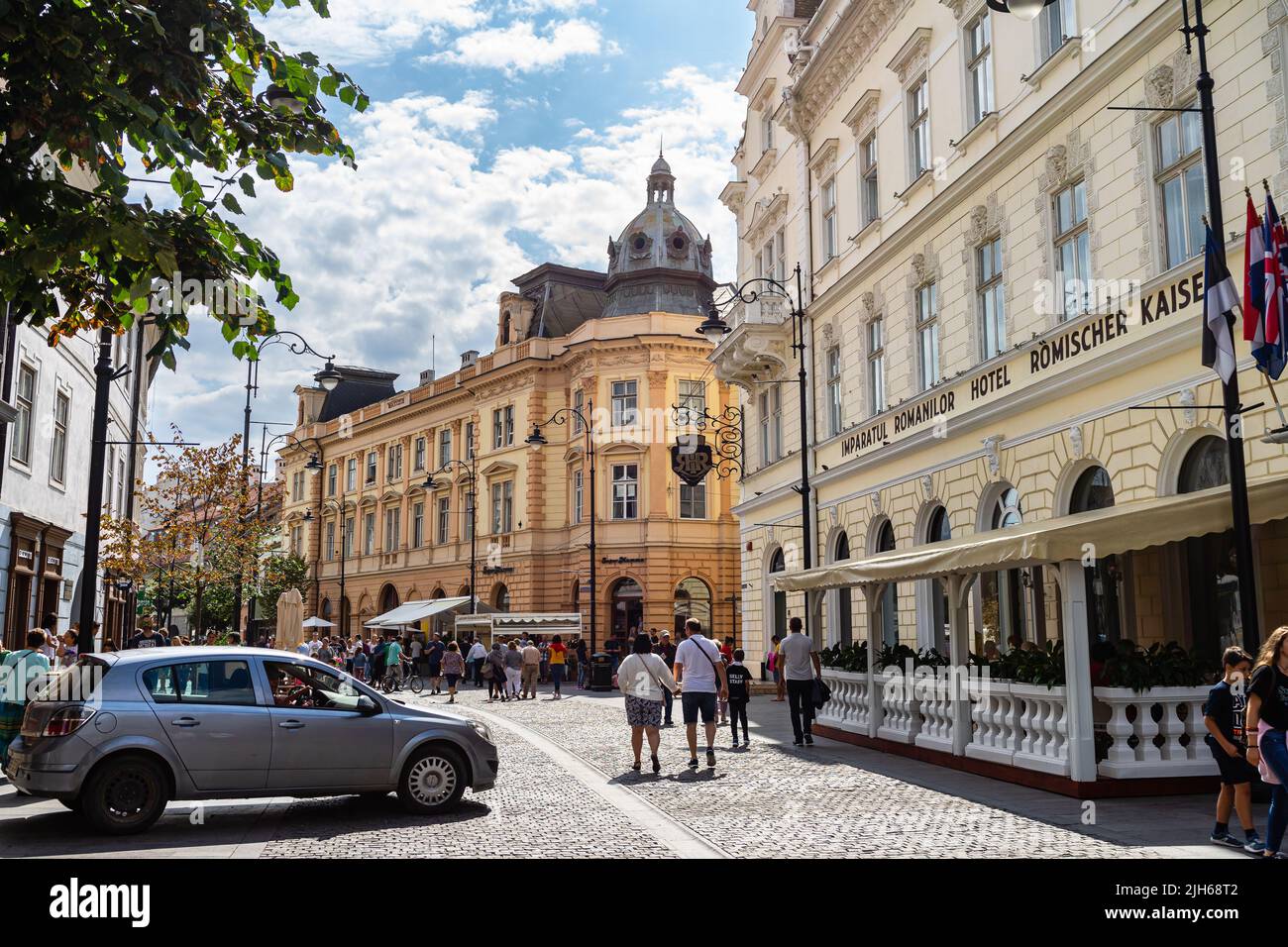 People and tourists wandering in old town Sibiu, Romania, 2022 Stock ...