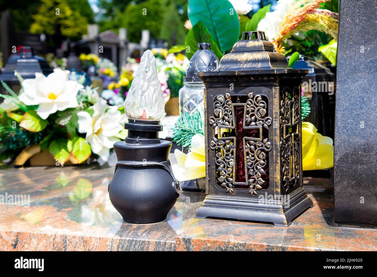 Memorial candles at a typical Roman Catholic Polish cemetery (Cmentarz ...