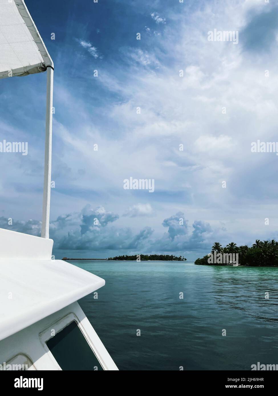 View from yacht on a two tropical islands in ocean Stock Photo - Alamy