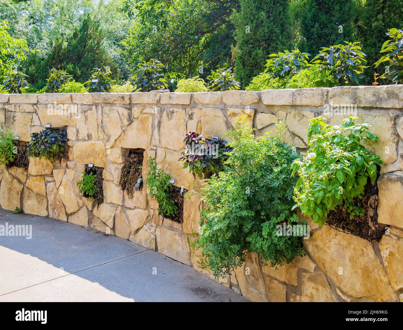 Sunny view of the landscape in Botanica, The Wichita Gardens at Kansas ...