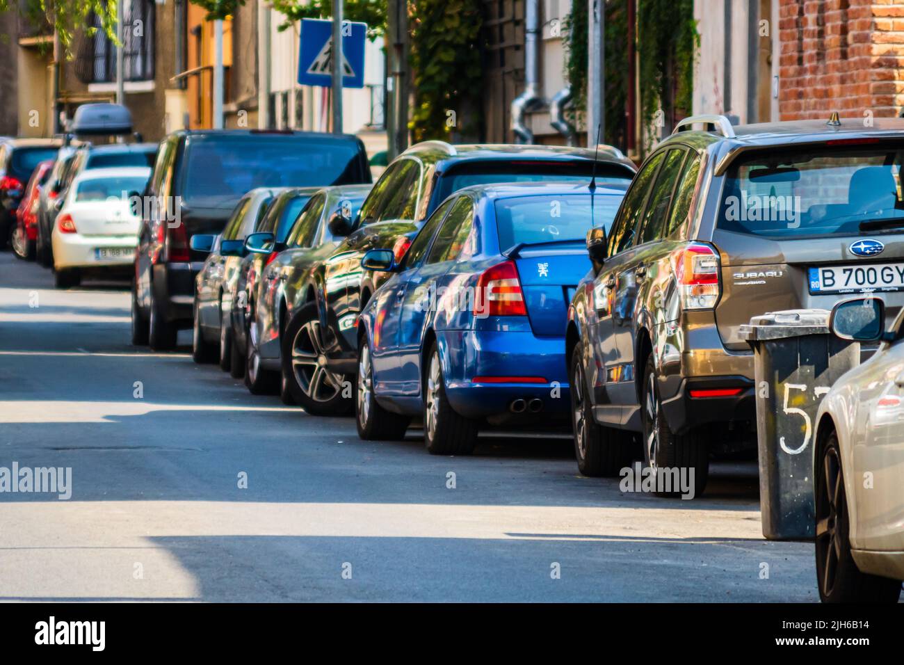 Car traffic at rush hour in downtown area of the city. Car pollution ...