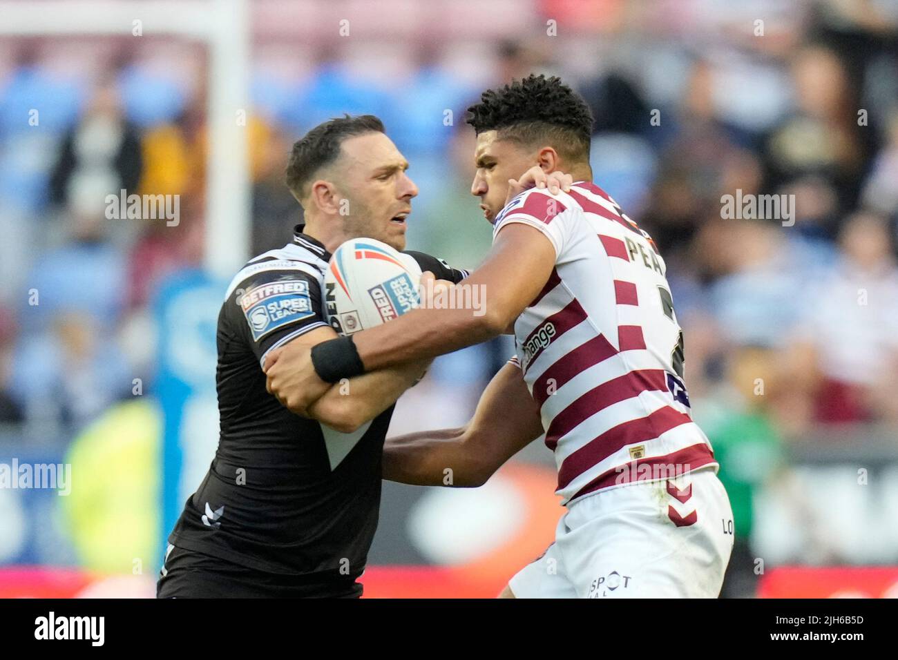 Kai Pearce-Paul #21 of Wigan Warriors holds Luke Gale #7 of Hull FC in ... Kai Pearce-Paul #21 of Wigan Warriors holds Luke Gale #7 of Hull FC in ...