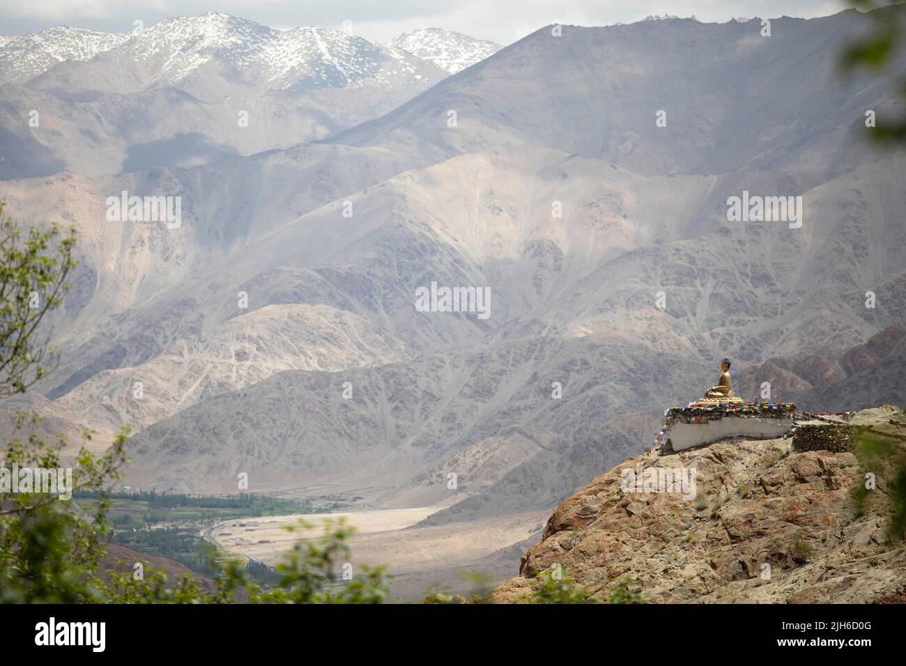Maitreya Buddha at Hemis Gompa, Shang mountain range in the background ...