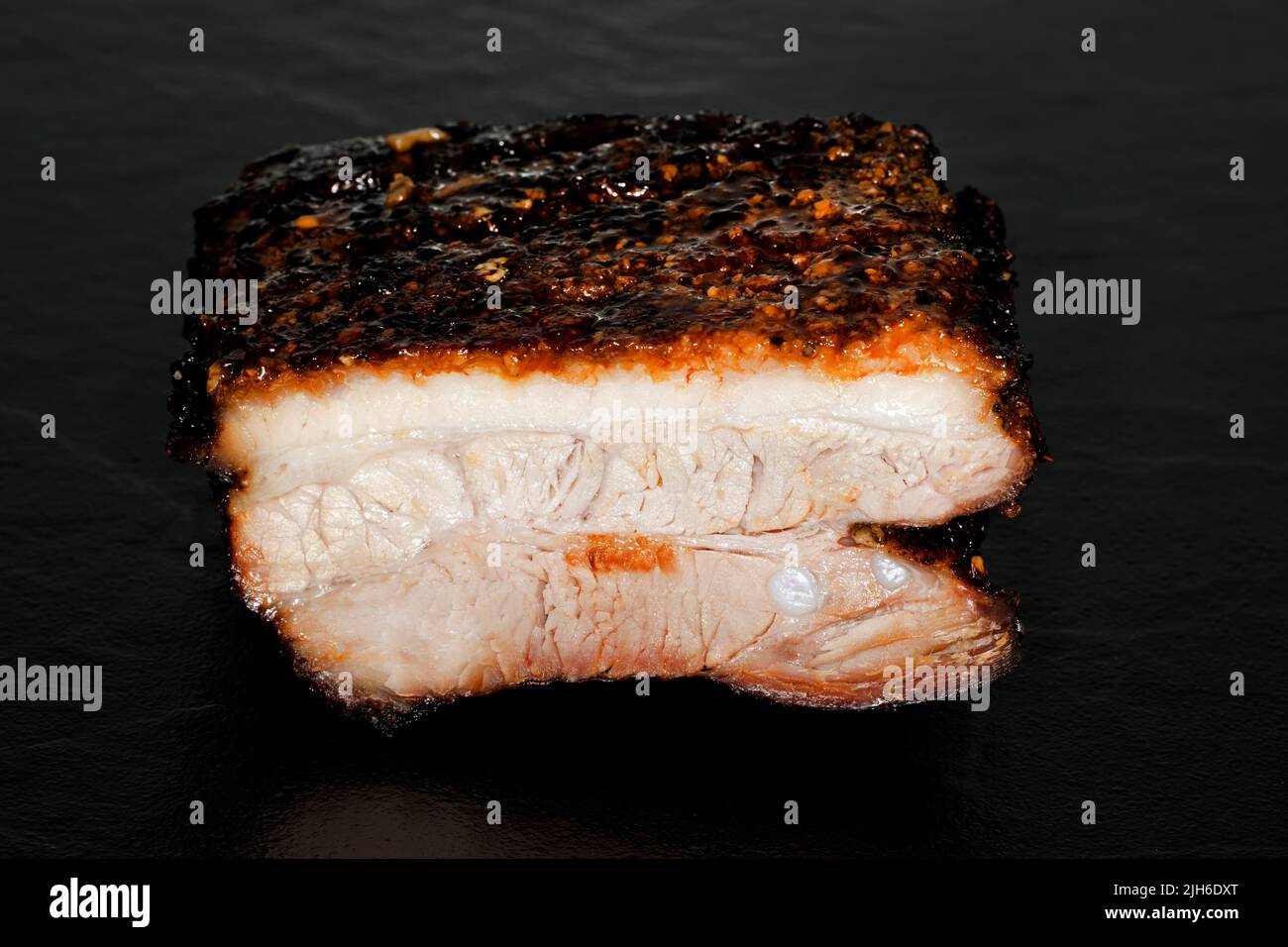 Roasted pork ribs, spare ribs, food photography with black background ...