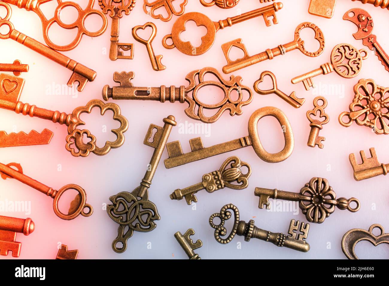 Retro style metal keys on a white background Stock Photo - Alamy