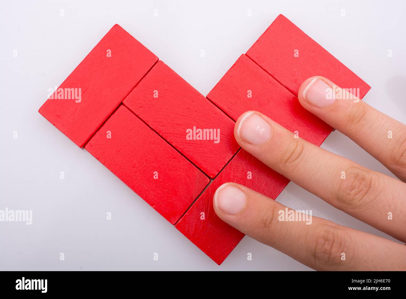 Colorful domino pices are forming a Sun shape Stock Photo - Alamy