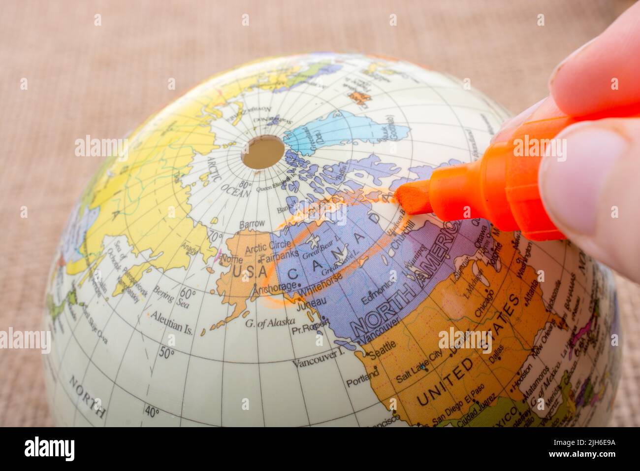 Globe is placed on canvas background Stock Photo - Alamy
