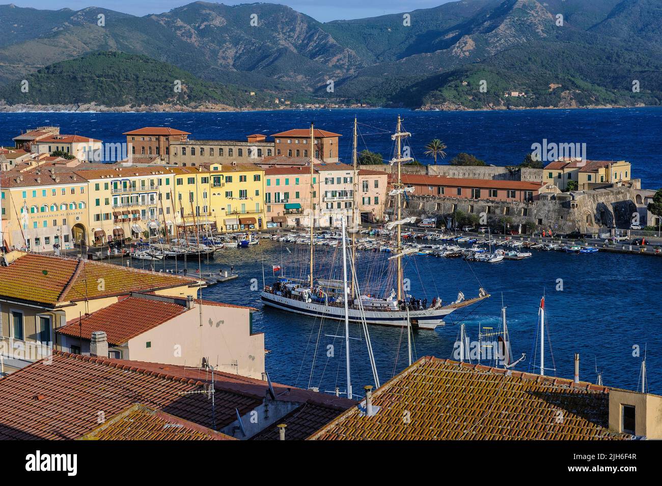 View of the old harbour of Portoferraio, in it three-master with ...