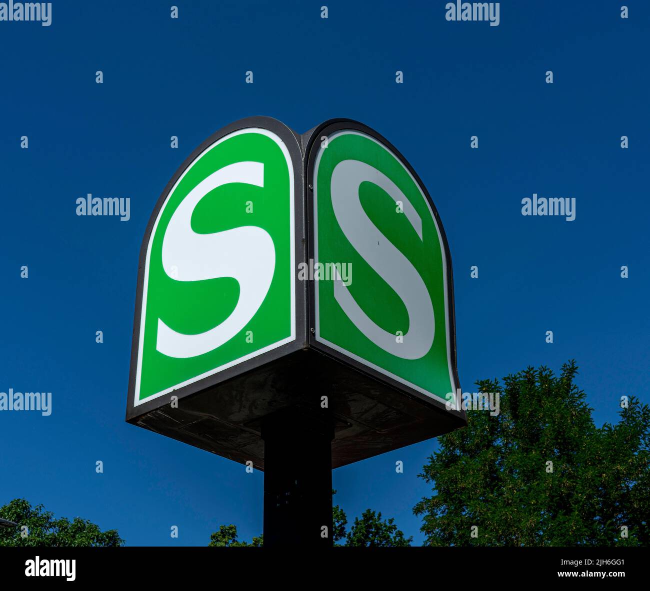 S-Bahn logo against a blue sky, Berlin, Germany Stock Photo - Alamy