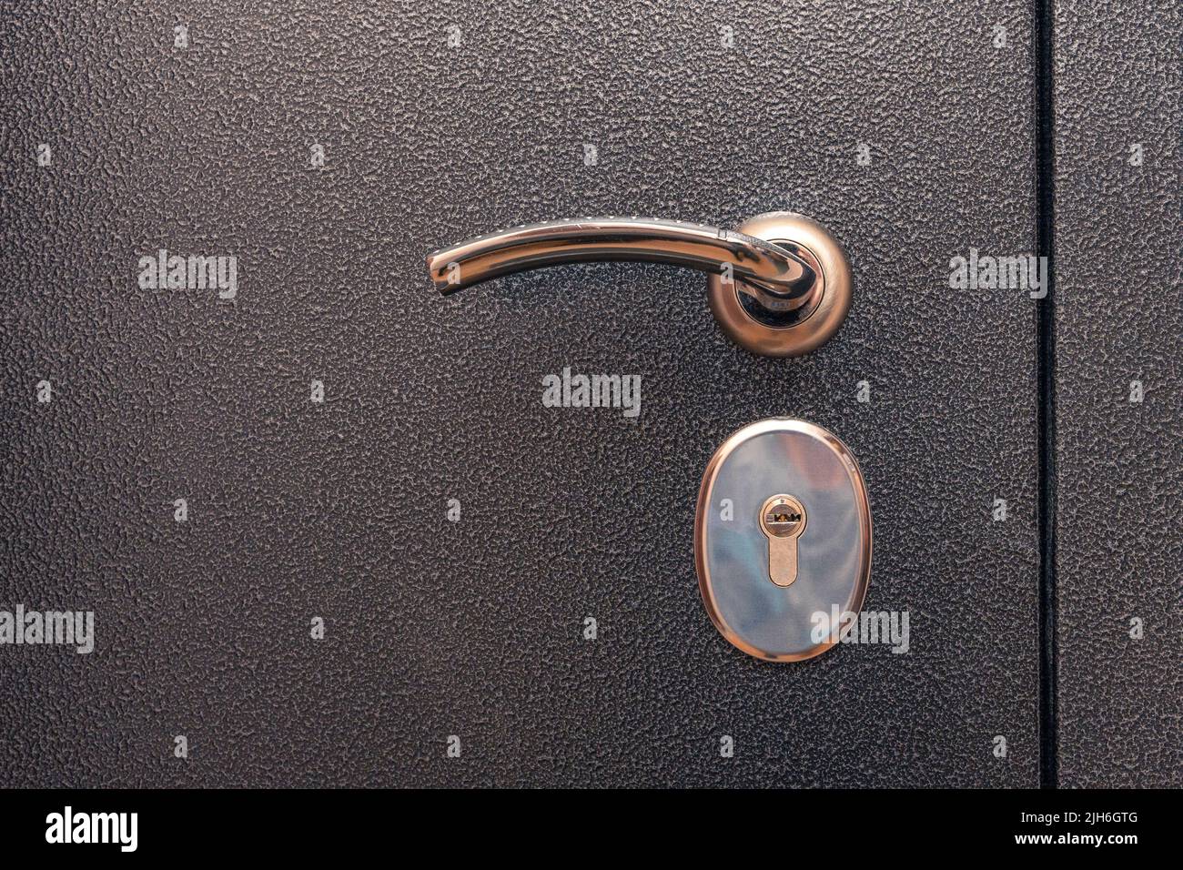 Close up metallic door handle hi-res stock photography and images - Alamy