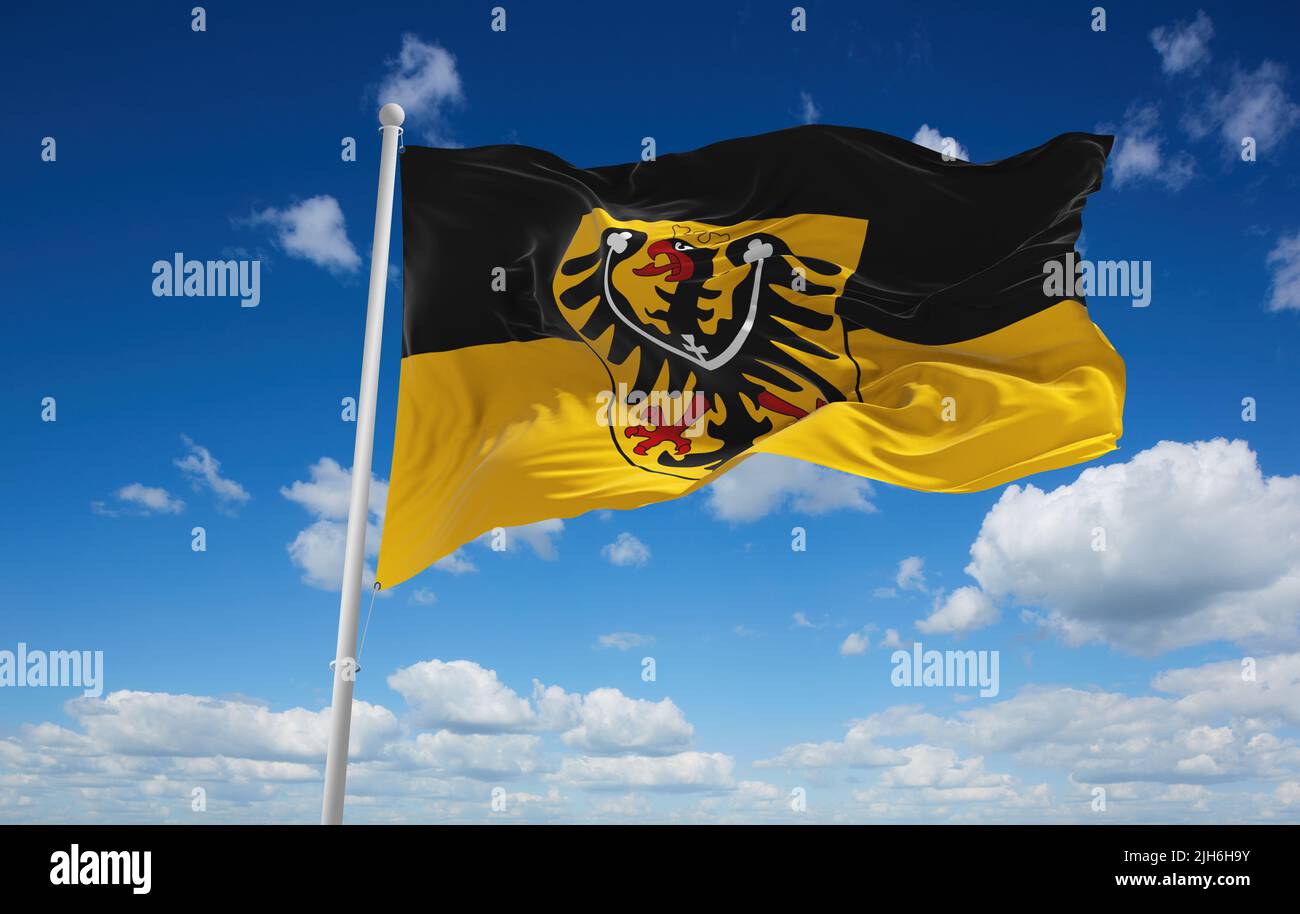 official flag of Austrian Silesia Austria at cloudy sky background on ...