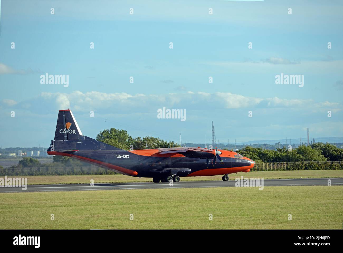 CAVOK Air's ANTONOV AN-12, UR-CEZ, taxiing to runway 27 at LIVERPOOL ...