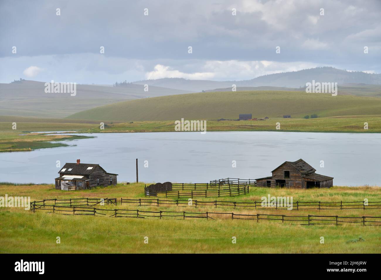 Rustic Ranch Buildings Rainstorm. Rustic ranch buildings in a rain ...